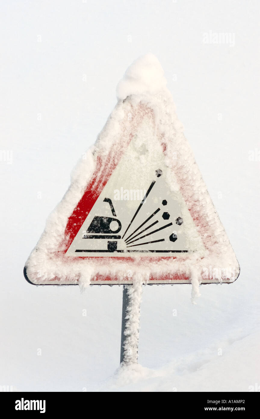 road warning sign snow covered close up Stock Photo - Alamy