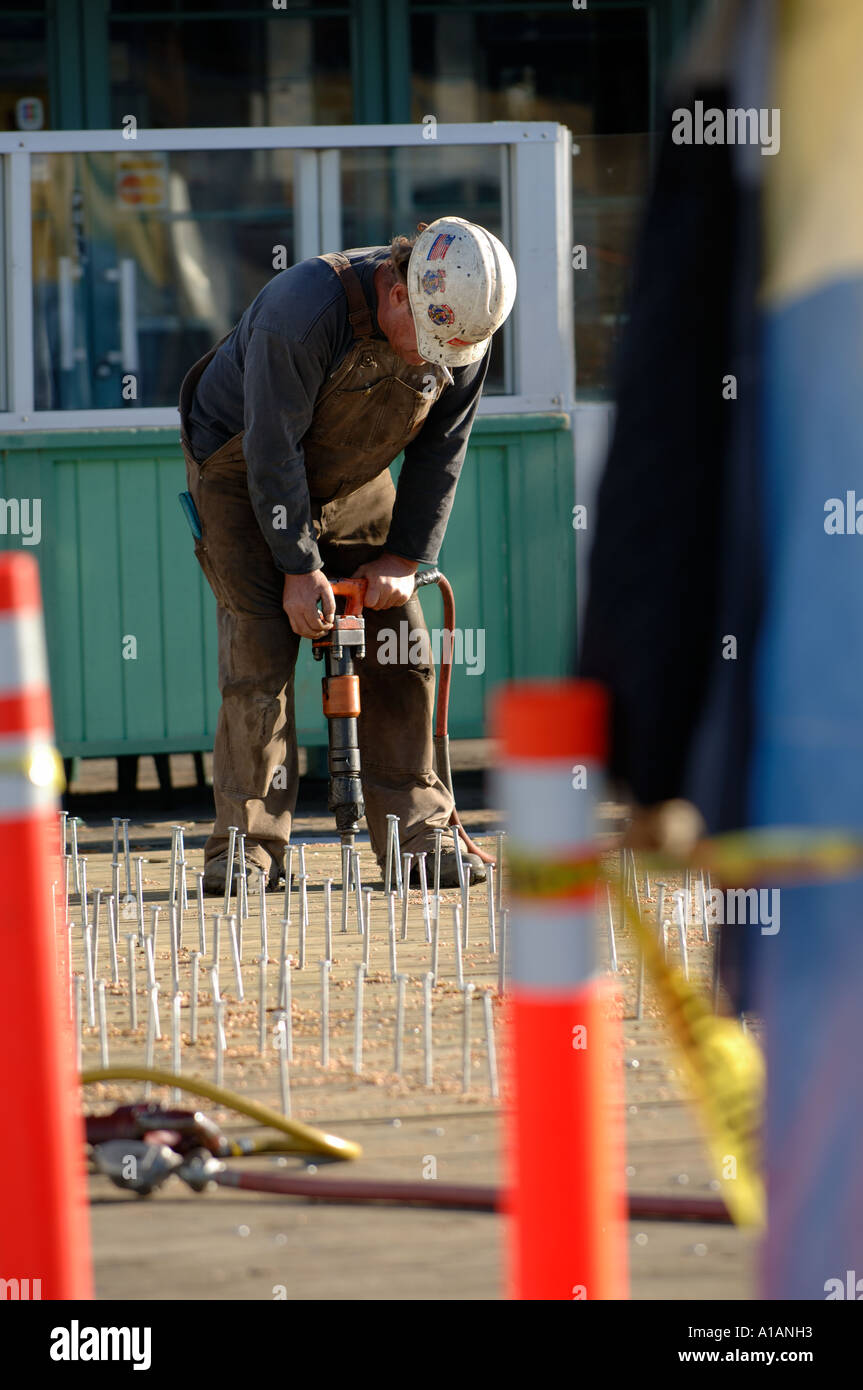Construction workers working on Santa Monica Municipal Pier CALIFORNIA ...