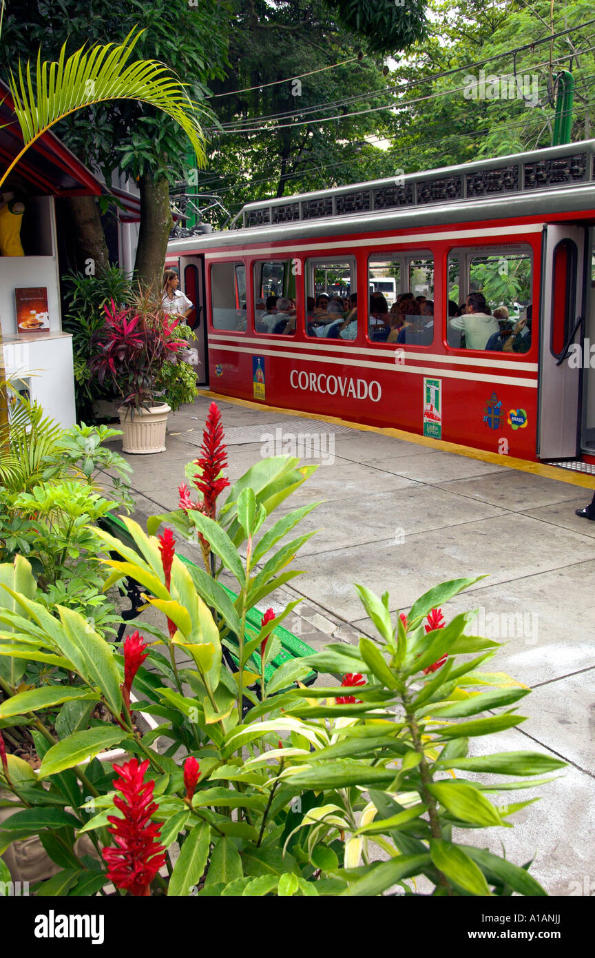 Bright red train cars at the train station for Corcovado in Rio De ...