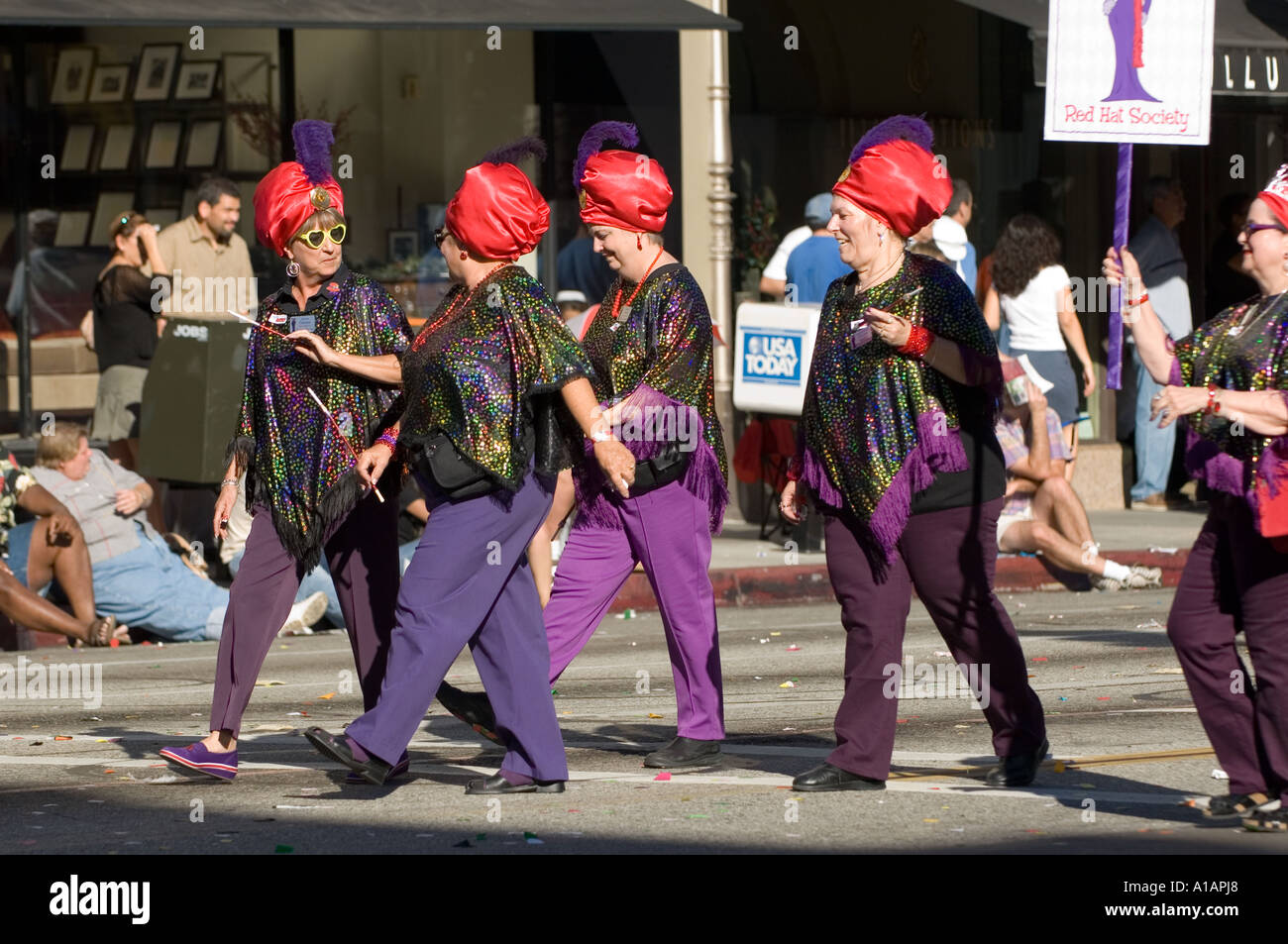 Participants march at the Doo-Dah Parade on Colorado Blvd. in Pasadena ...