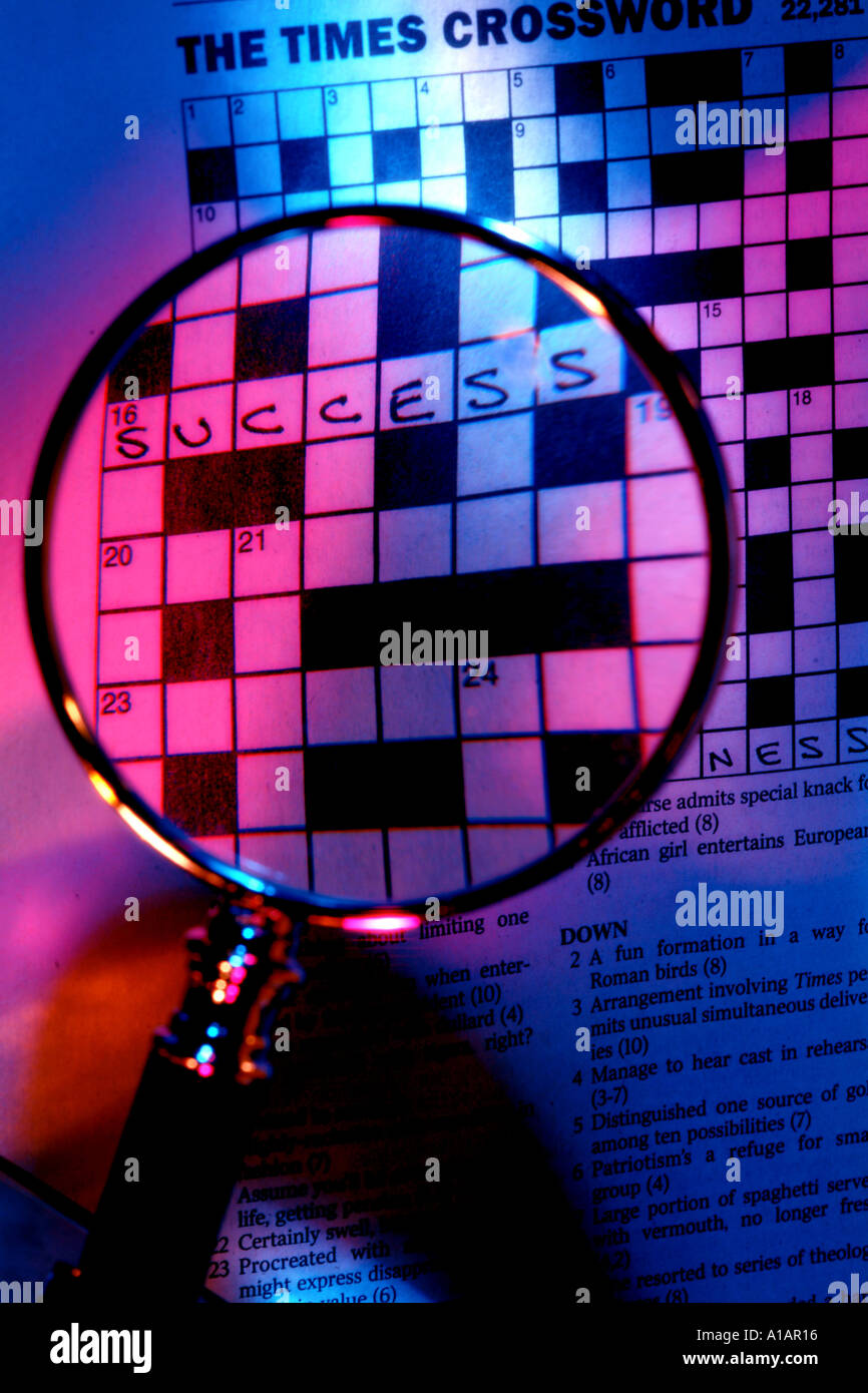 Magnifier and Crossword Stock Photo - Alamy