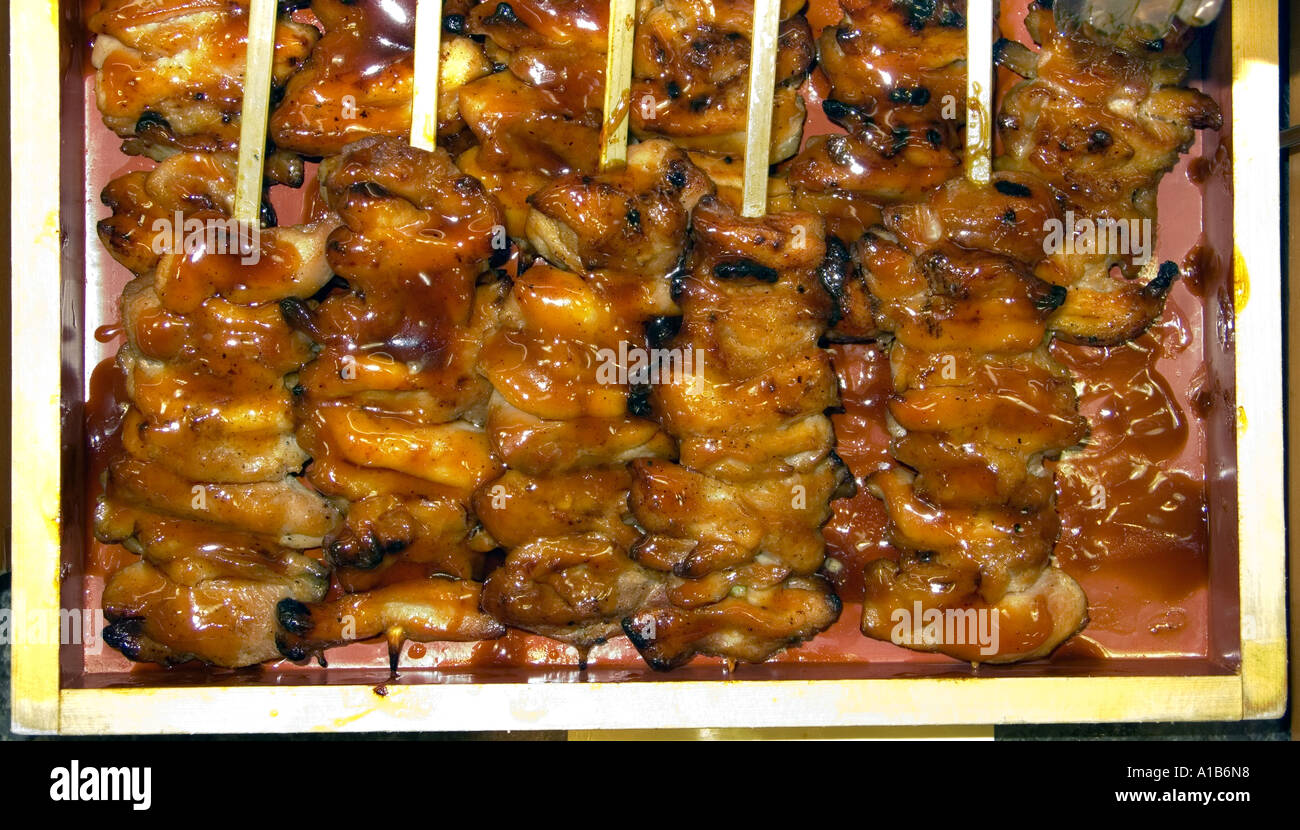Yakitori Delicious fried chicken kebabs on skewers cooked over hot ...