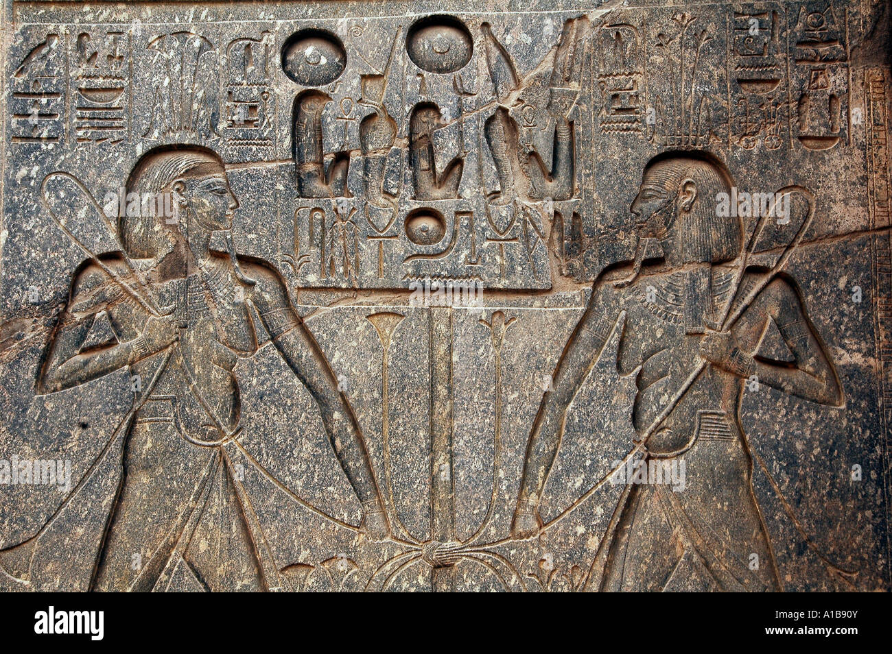 Hieroglyphic script engraved into a granite wall at Luxor Temple of ...