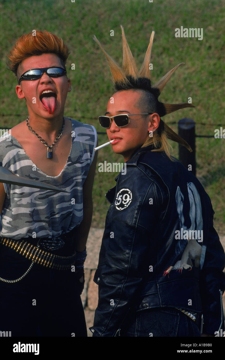 Two punks wearing sunglasses at Osakajokoen apos s Station Osaka Japan ...