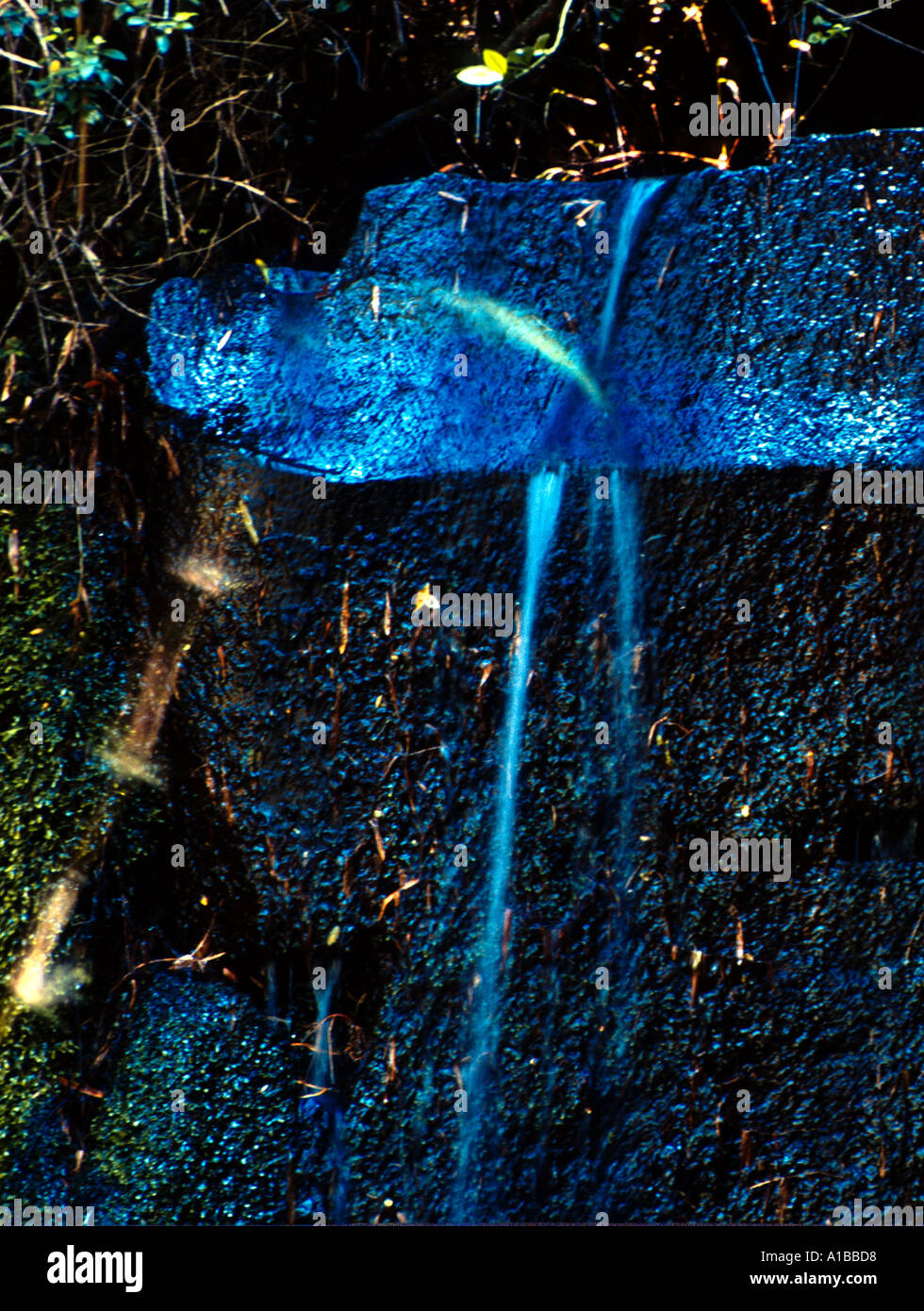 Hidden blue waterfall Stock Photo - Alamy