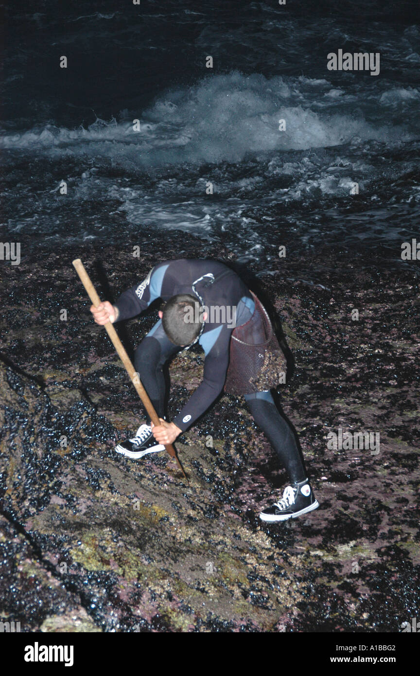 Popular spanish barnacle hunters called Percebeiros Stock Photo - Alamy