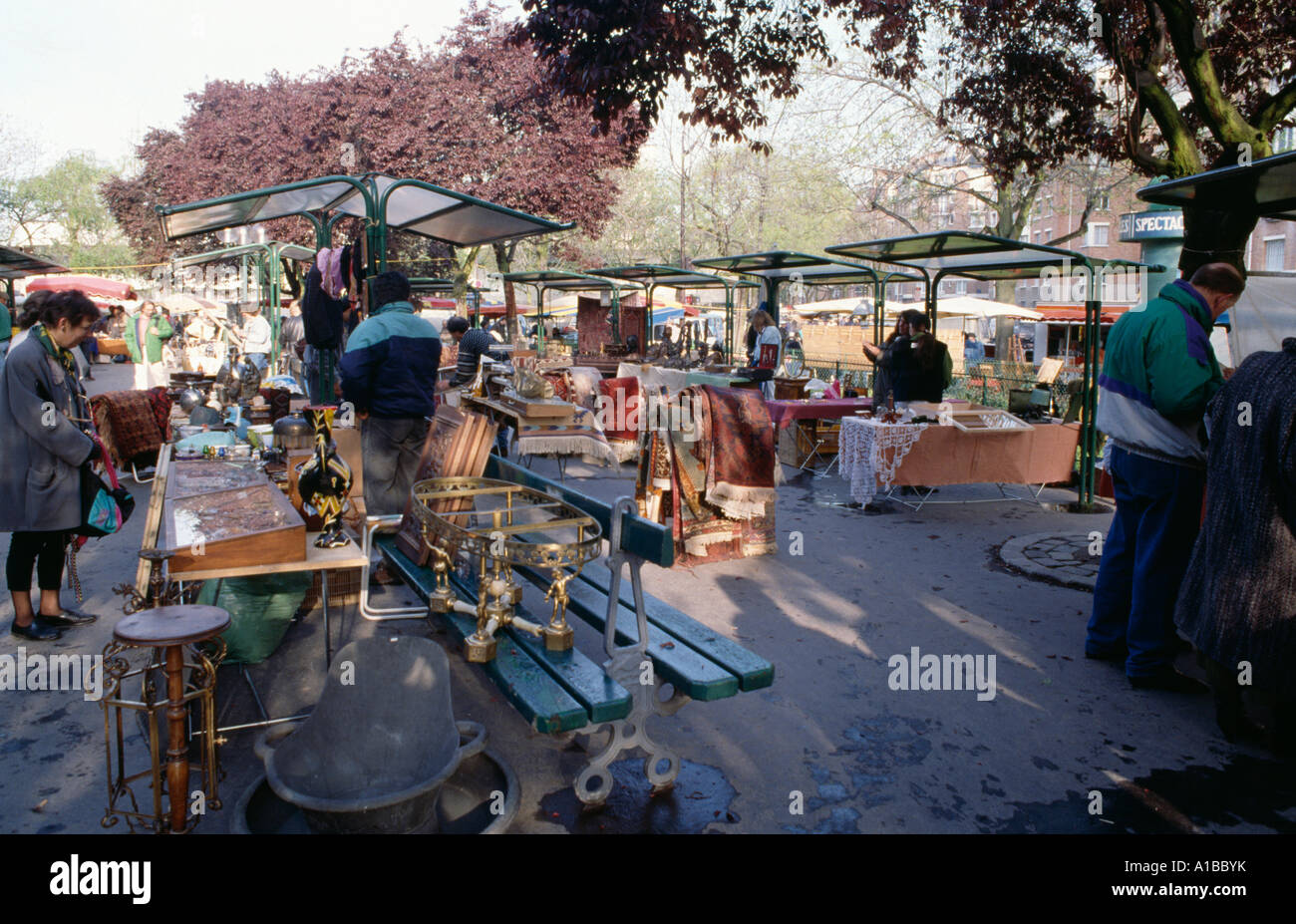 People browsing in outdoor French market stall Stock Photo - Alamy