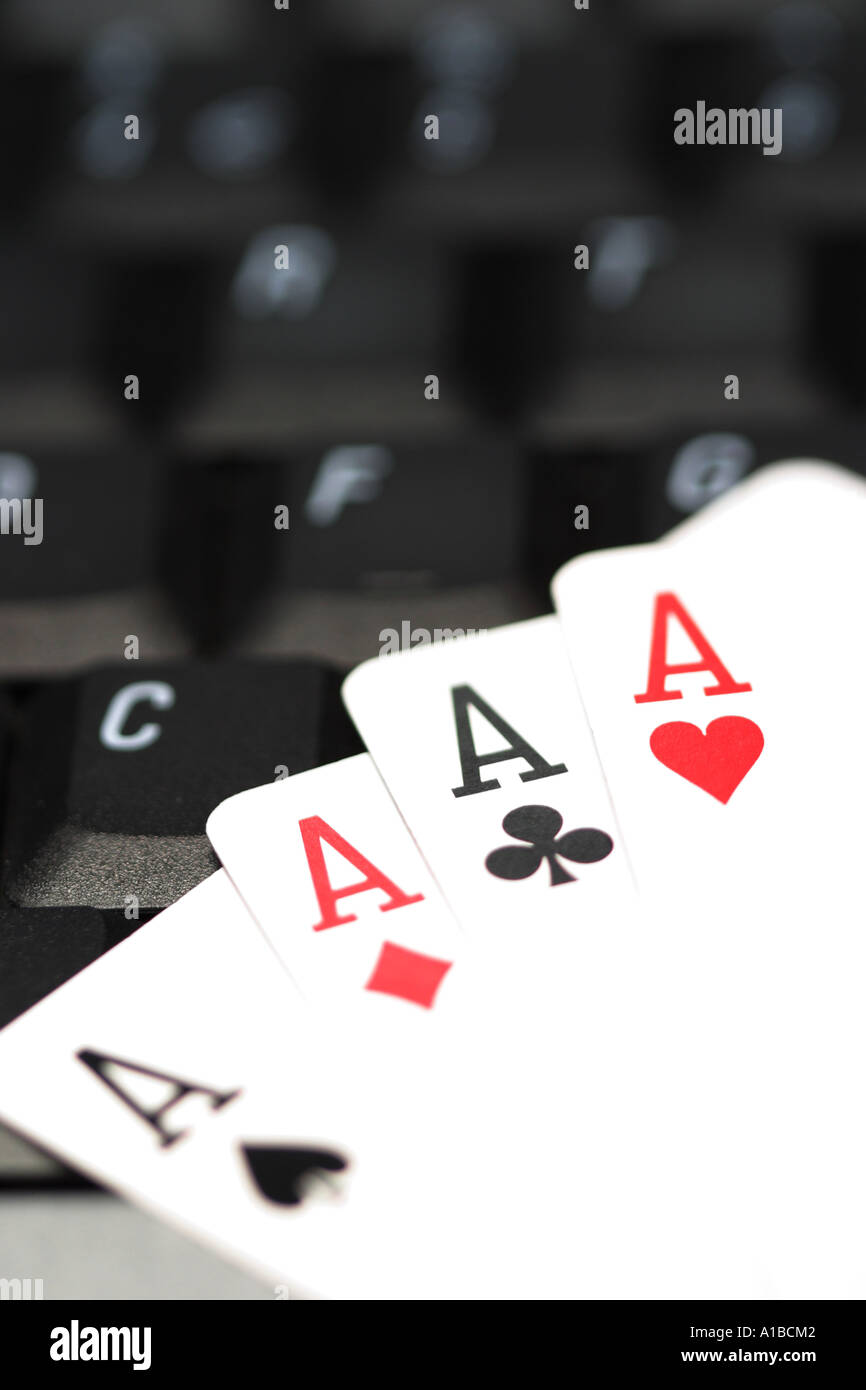 Four Aces on computer keyboard Stock Photo - Alamy
