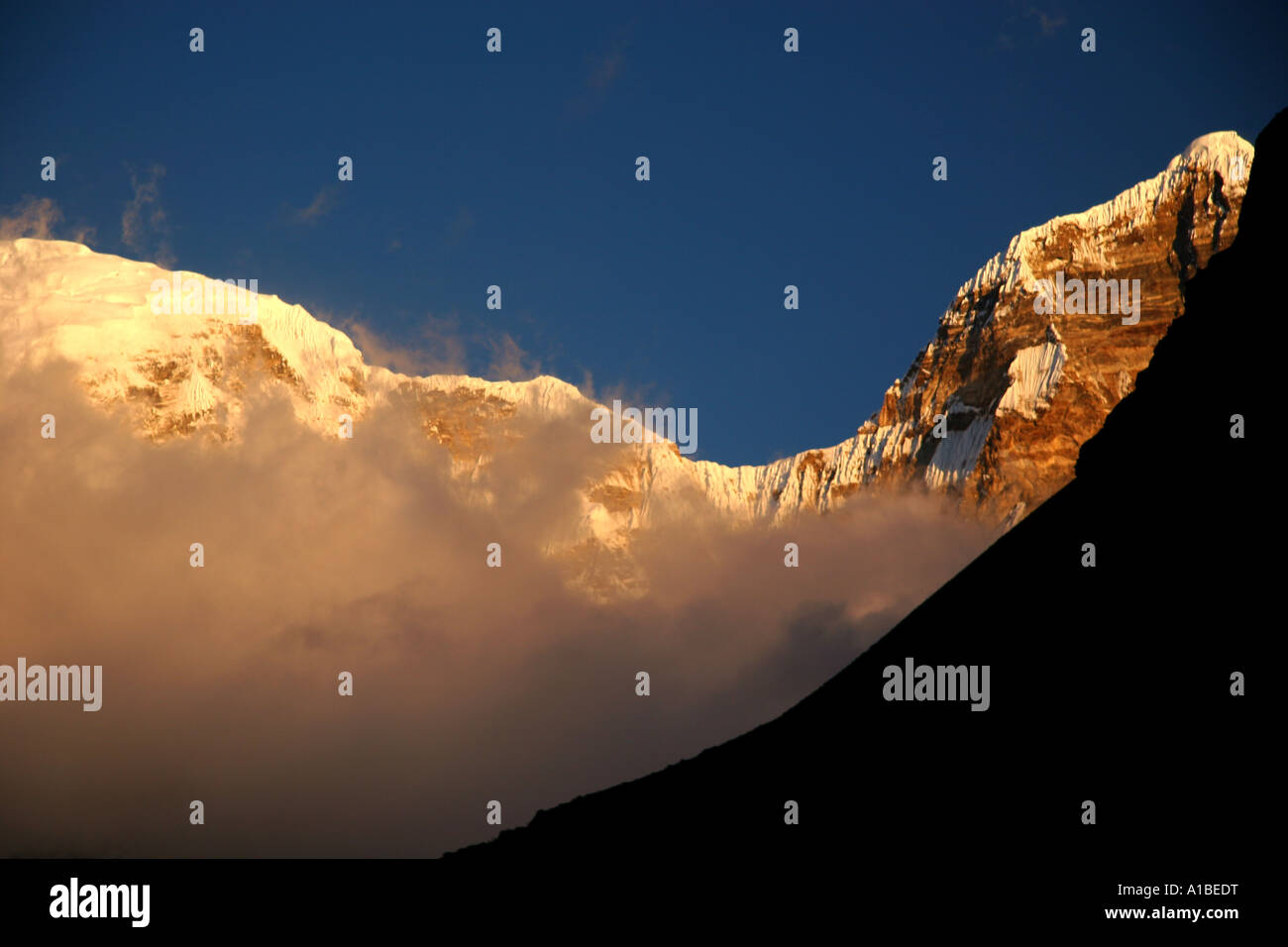 A ridge of Jhomolhari, Bhutan's second highest mountain catches the ...