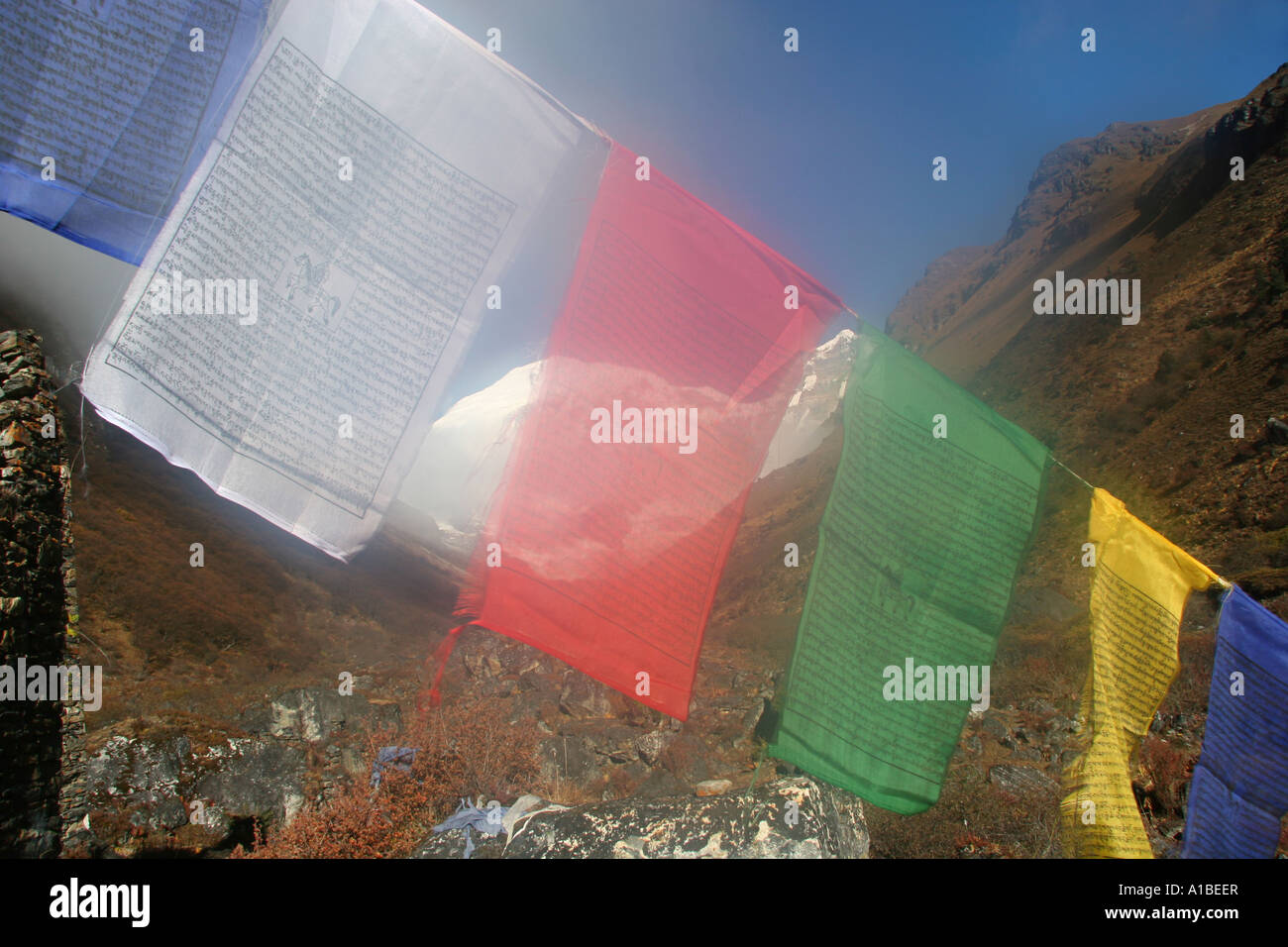 Jhomolhari, Bhutan's second highest peak as seen through prayer flags ...