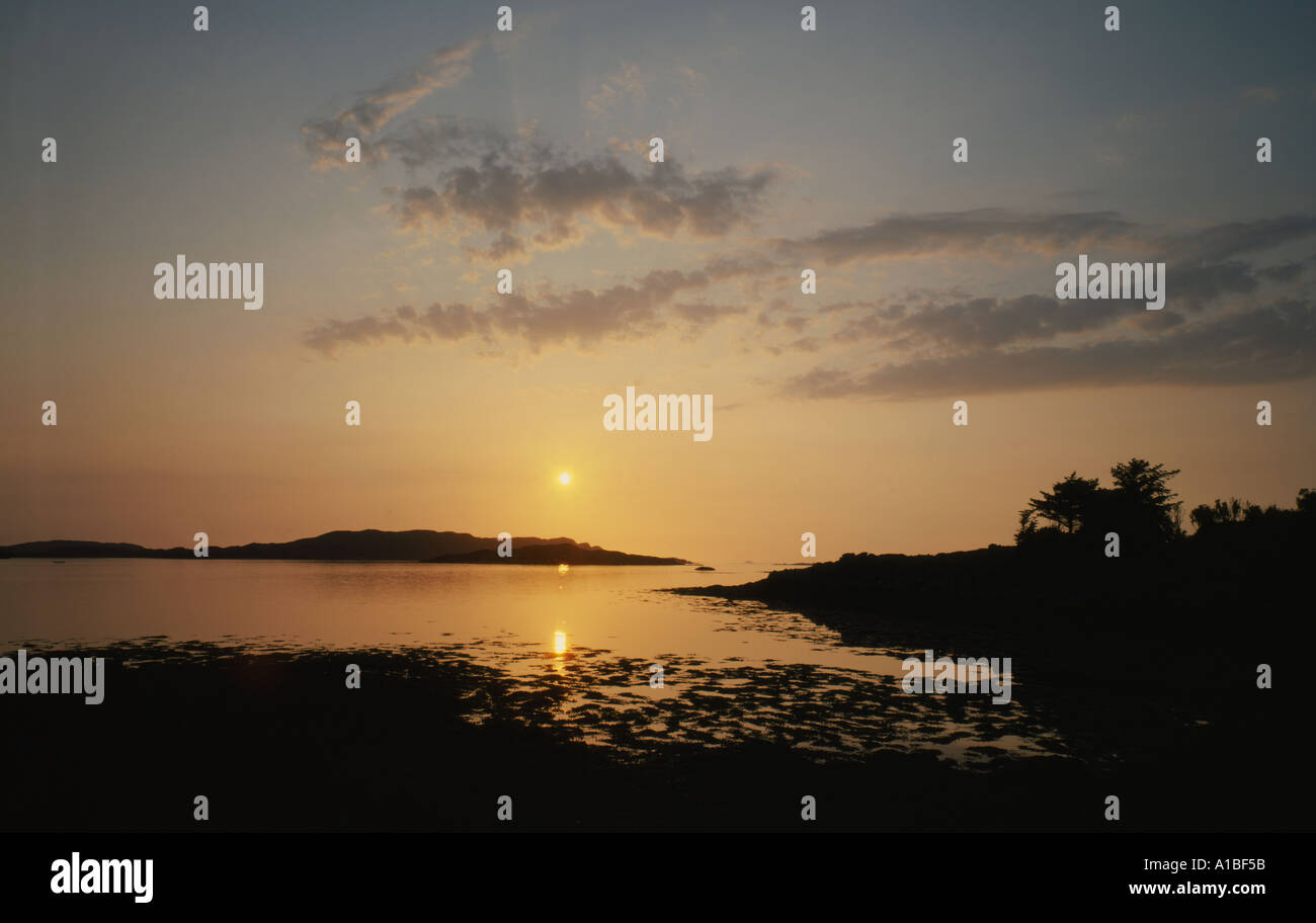 WArm summer sunset at Bunessan, Isle of Mull, western Scotland, UK ...
