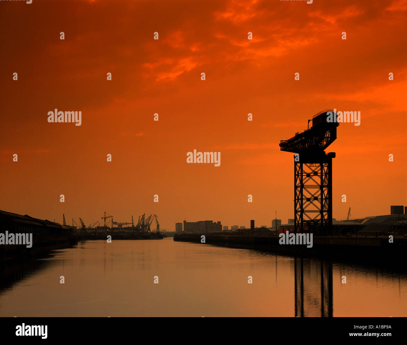Evening sky over River Clyde with giant block-setting crane, Glasgow ...