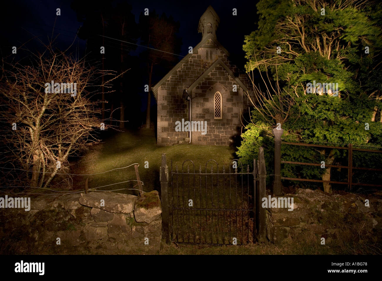 Church lit by torch light at night Kentallen Scotland UK Stock Photo ...
