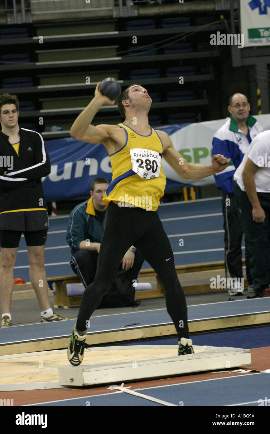Shot put competitor throws the shot at the Irish Indoor Athletics ...