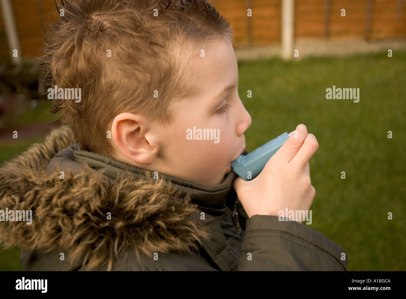 Boy using Ventolin inhaler outdoors Stock Photo - Alamy