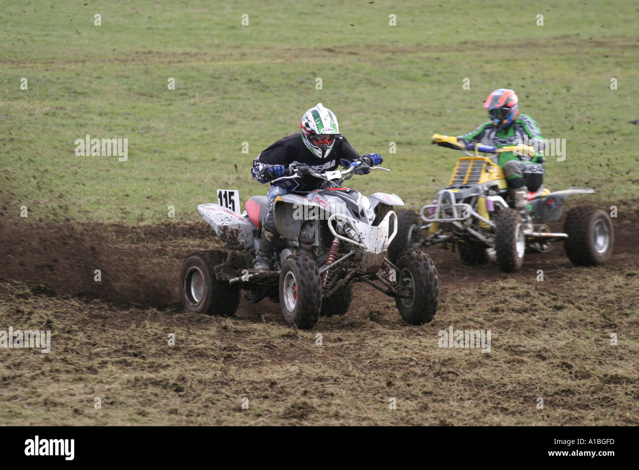 two quad Racers in action mud spraying from quad bike outside Ballymena ...