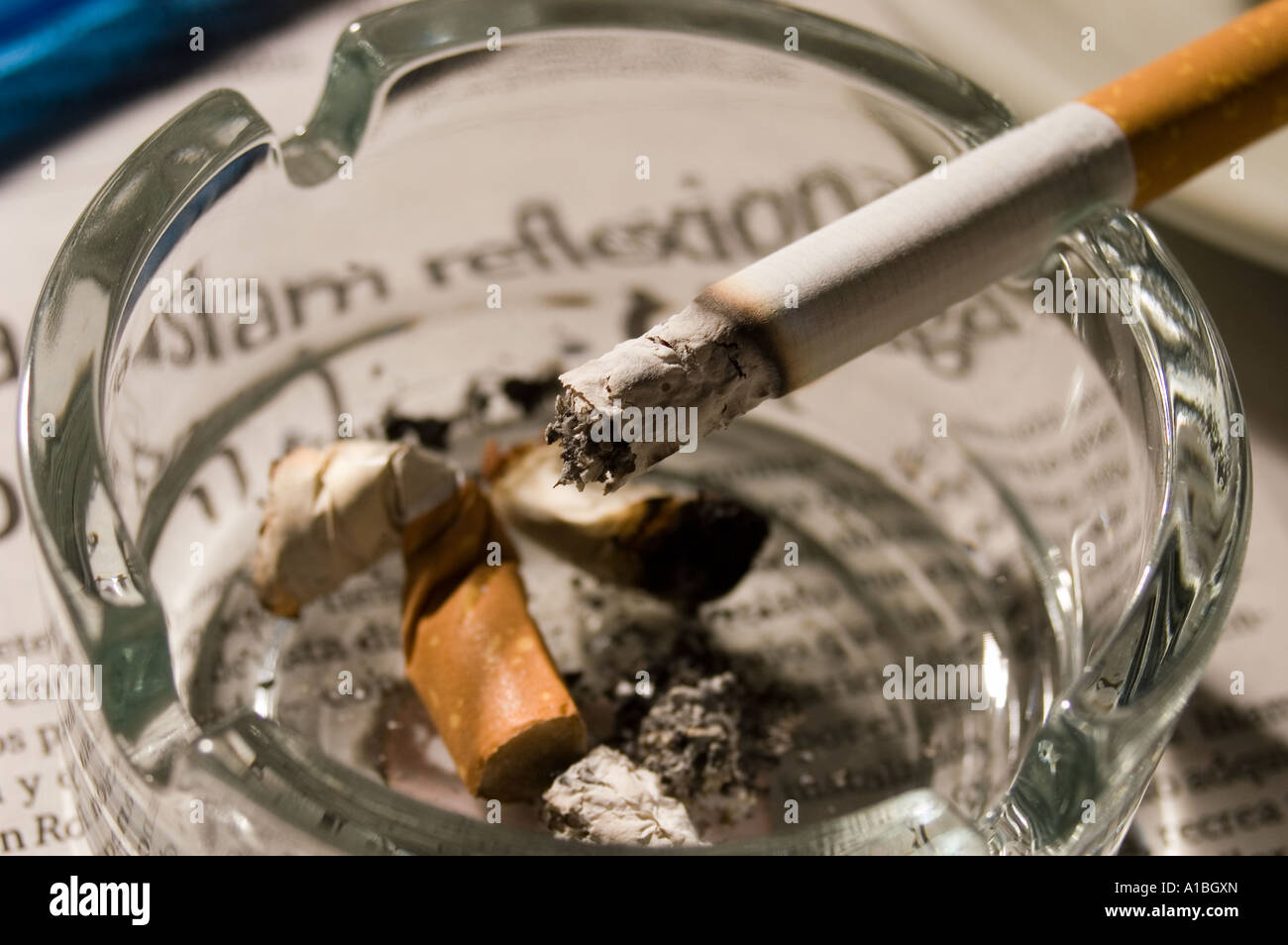 still life about tobacco extinguishing cigarrettes Stock Photo - Alamy