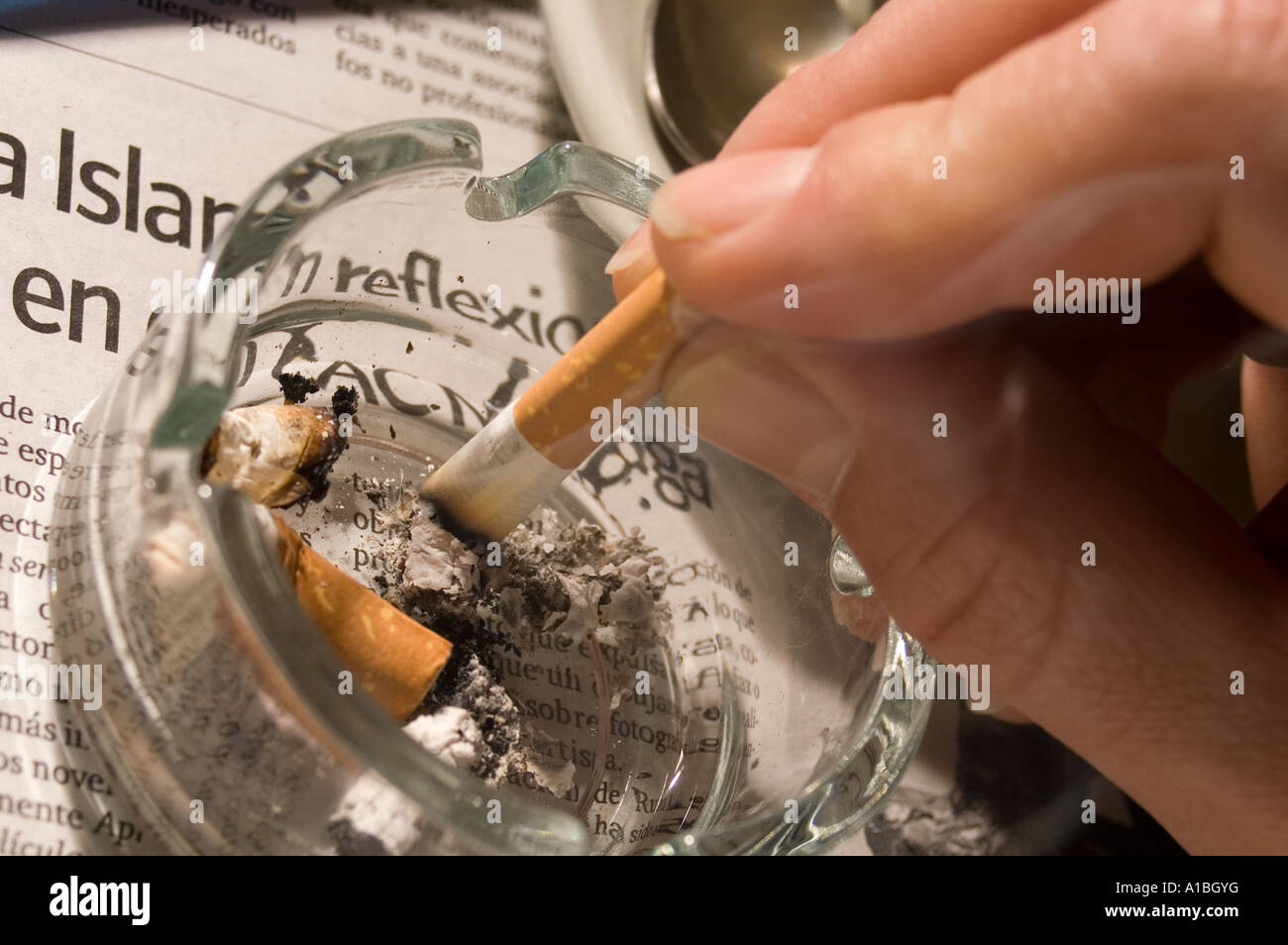 still life about tobacco extinguishing cigarrettes Stock Photo - Alamy