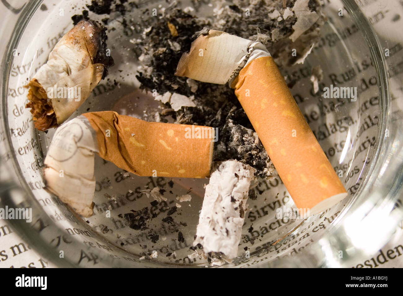 still life about tobacco extinguishing cigarrettes Stock Photo - Alamy