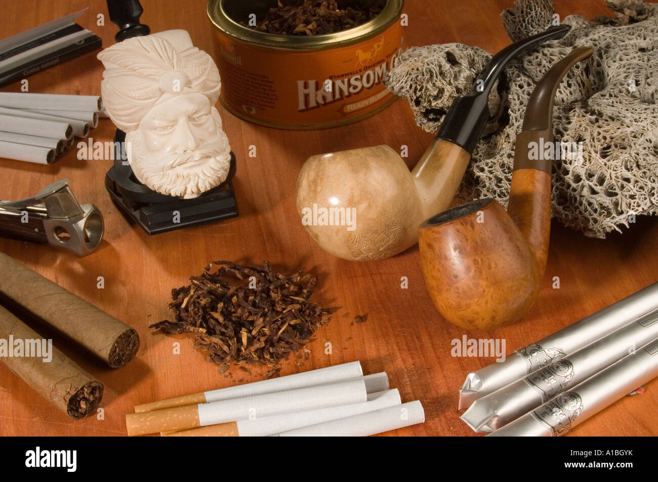 Cigarette tips in an open pack showing the foam texture of the filters ...