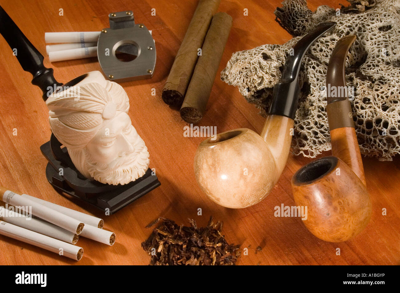 Cigarette tips in an open pack showing the foam texture of the filters ...