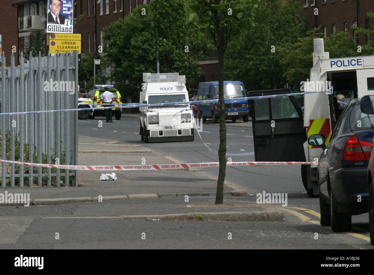 Police Service of Northern Ireland PSNI land rovers at cordoned off ...
