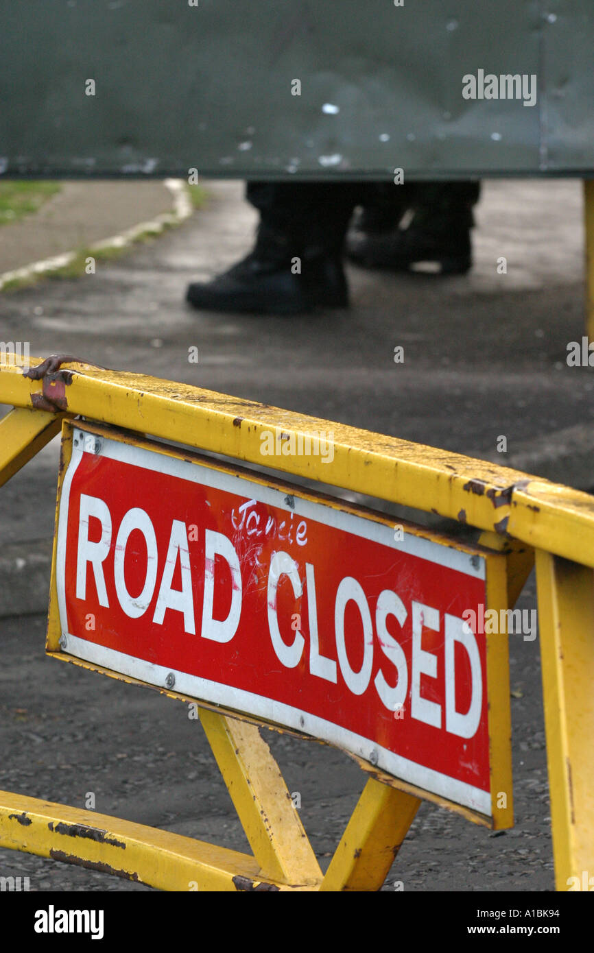 road closed sign at PSNI RUC British Army barricade at interface area ...