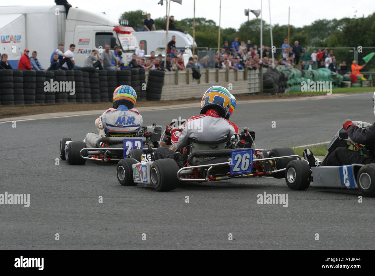 The leaders of the Rotax Max kart race round the first corner watched ...