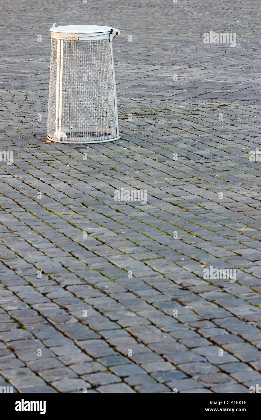 empty litter bin on cobbles, rome, italy Stock Photo - Alamy