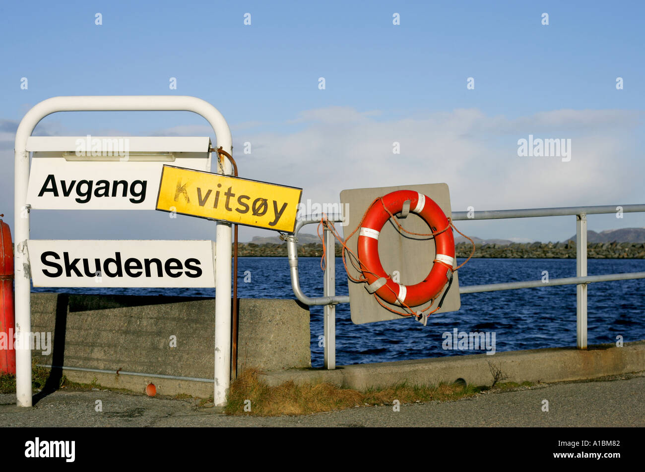 Direction sign on ferry quay Stock Photo - Alamy
