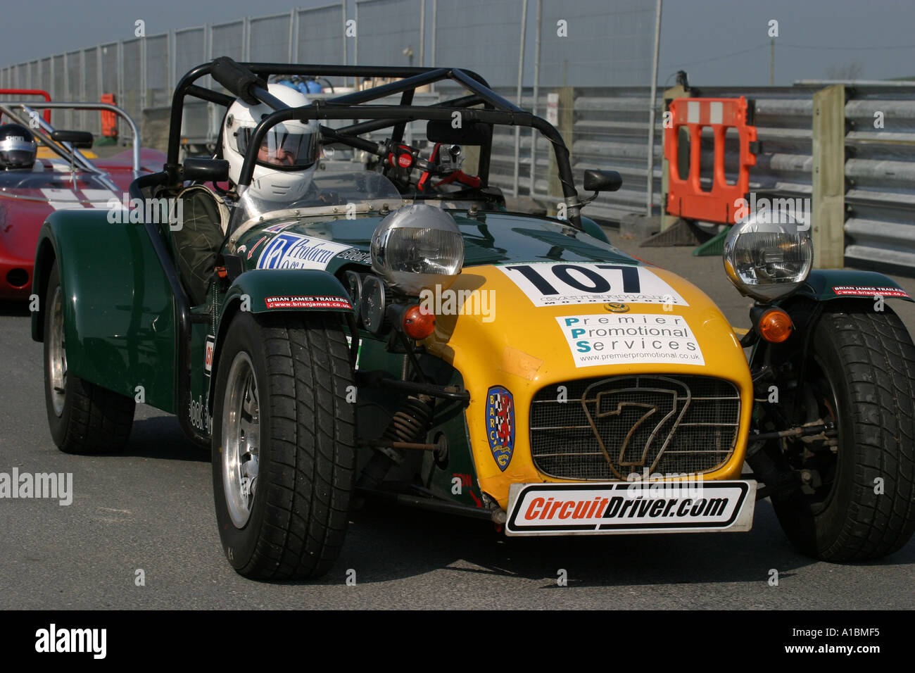 British racing green yellow 1 6 caterham GM on grid in pit lane ...