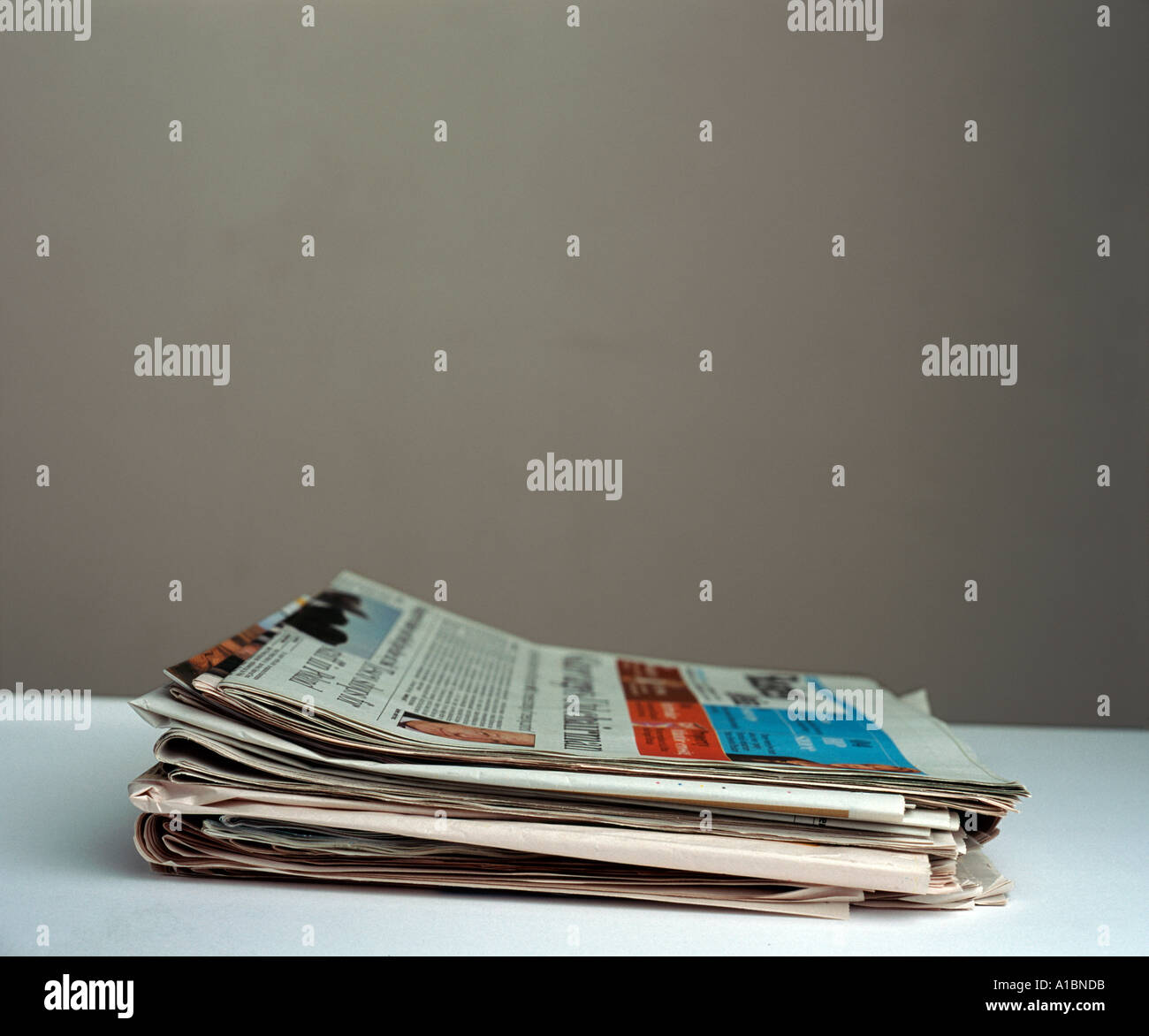 A small pile of UK newspapers Stock Photo - Alamy