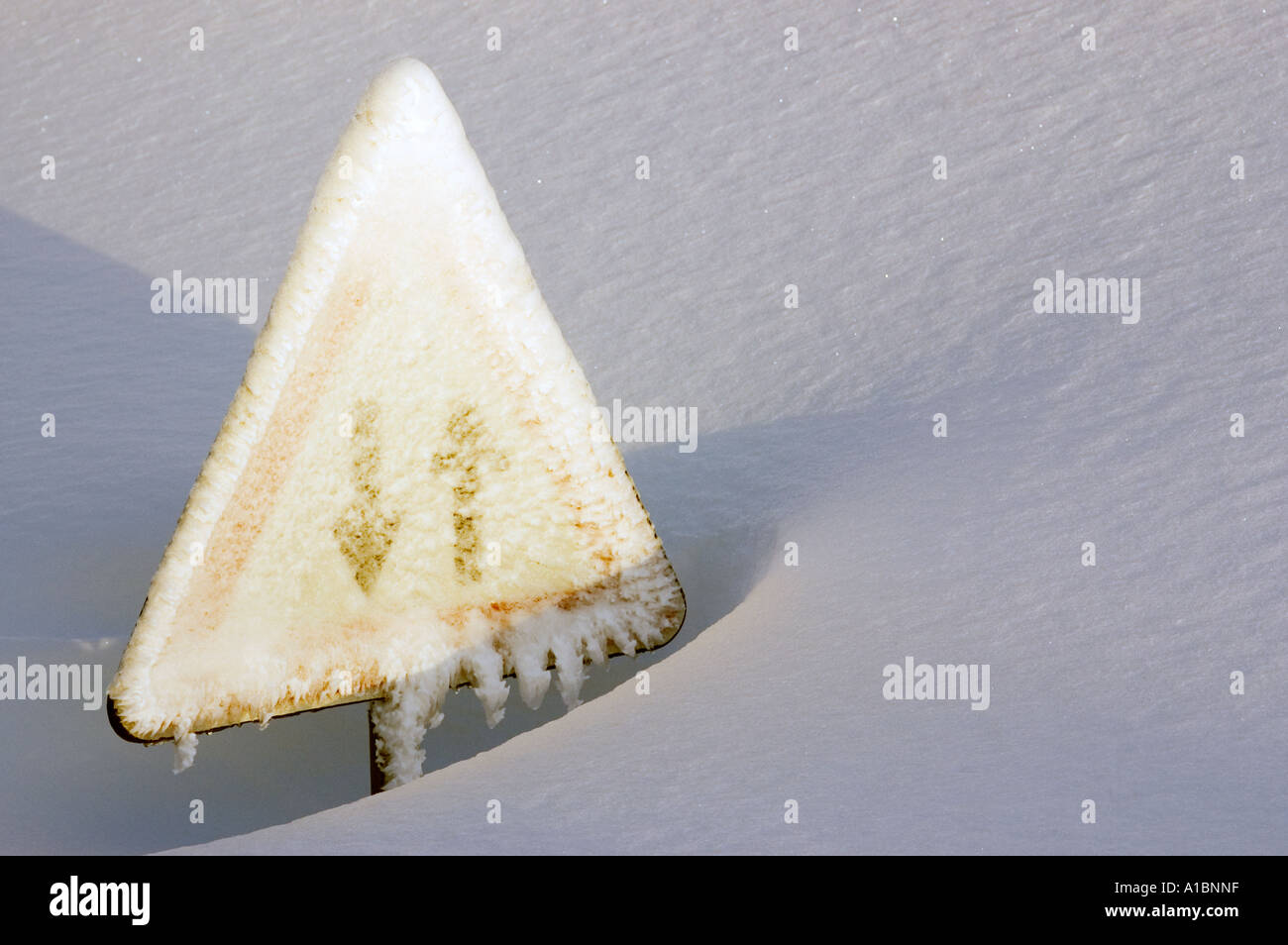 road signs with arrows snow covered Stock Photo - Alamy