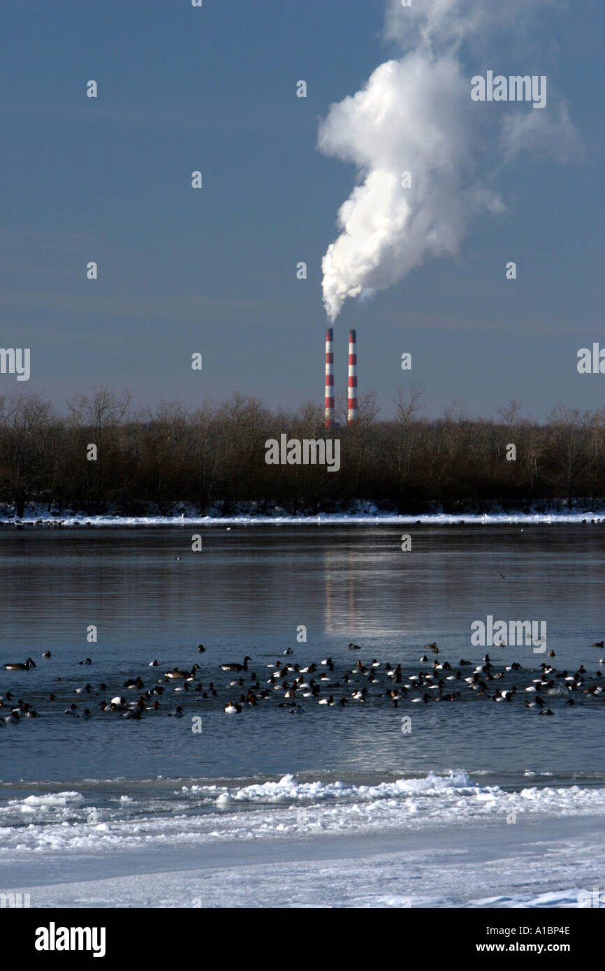 a factory in southern Michigan bellowing out air pollution on a cold ...