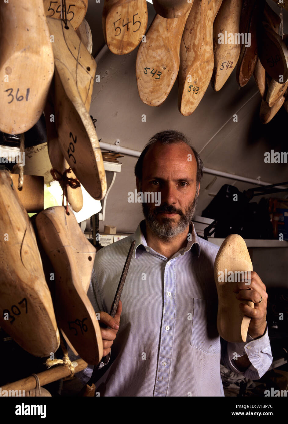 Making lasts for riding boots Stock Photo - Alamy