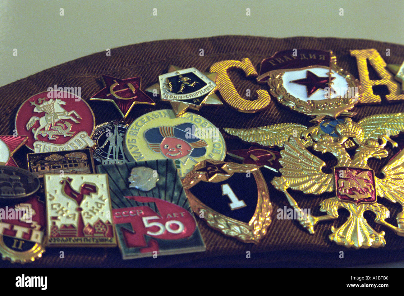 A souvenir hat with insignia from the Soviet Communist era Stock Photo ...