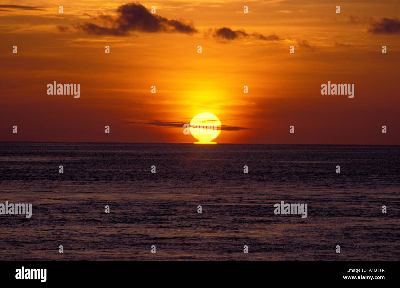 Sunset over Pacific Ocean Banda Sea Indonesia Stock Photo - Alamy