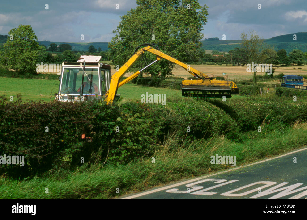 Tractor mounted hedge trimming machine, North Yorkshire, England, UK ...