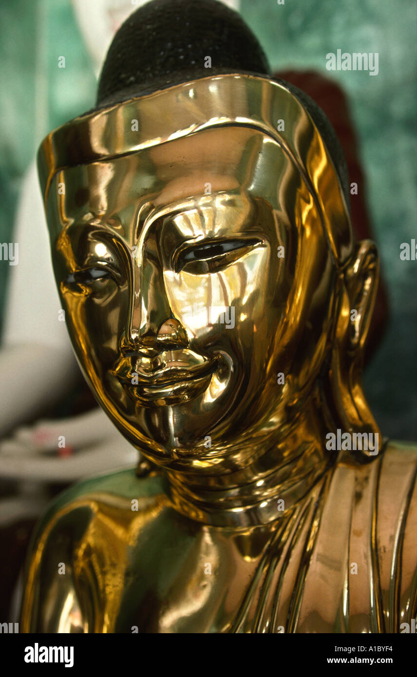 Myanmar Burma Yangon Rangoon Shwedagon Pagoda polished face of brass ...