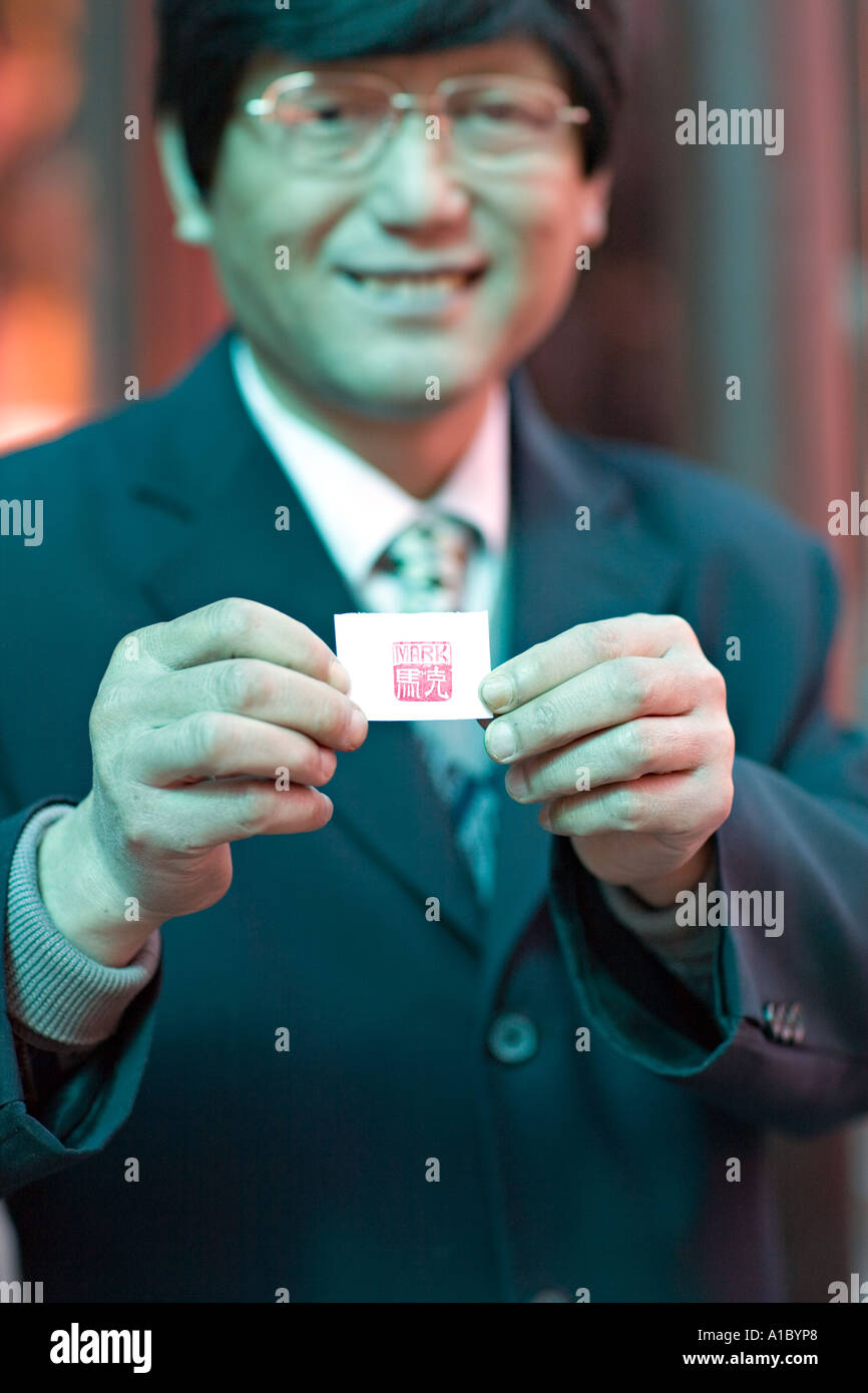 CHINA BEIJING Chinese artist proudly displays chop that he has carved ...
