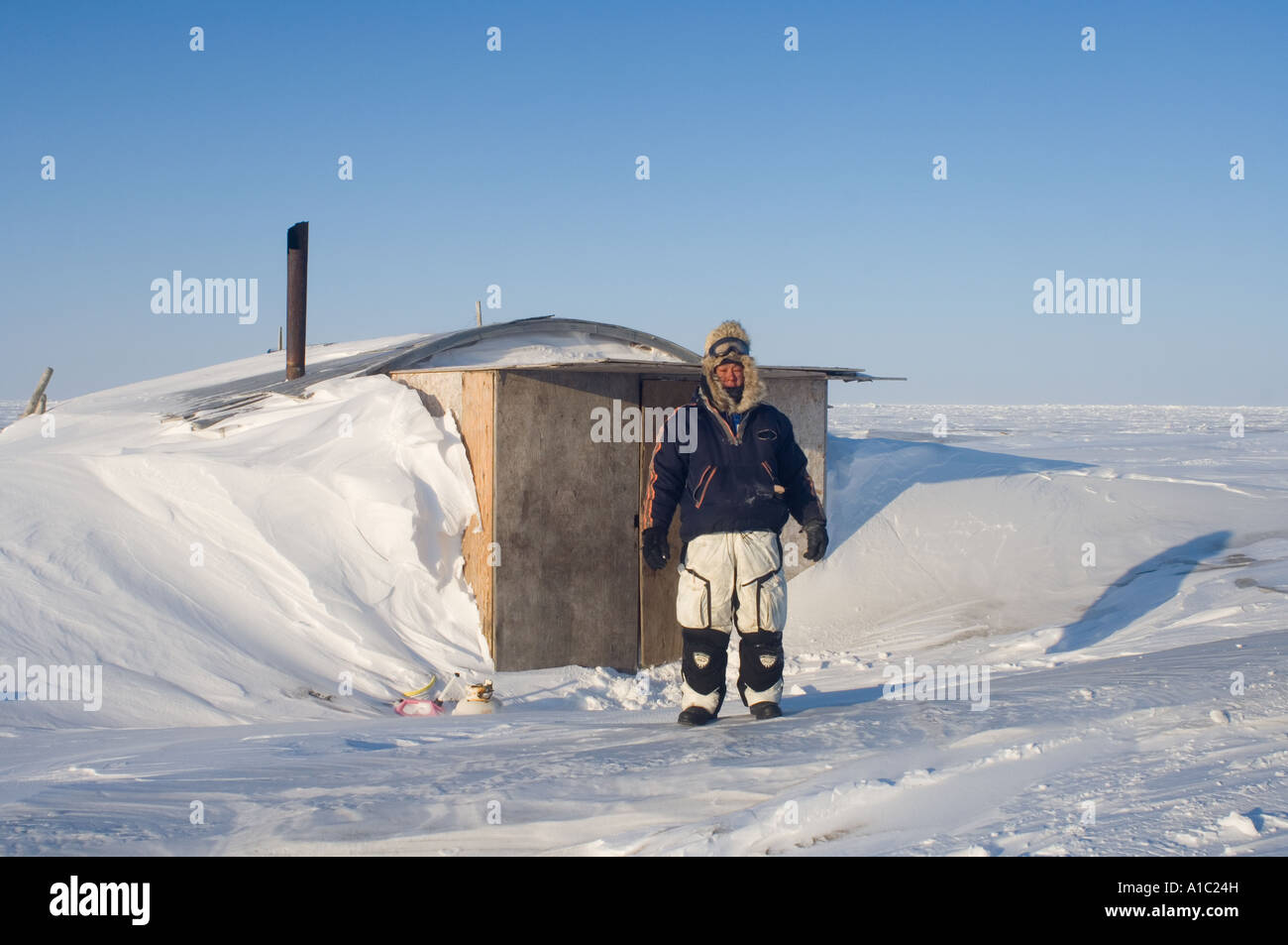 Inupiat guide outside a cabin along the Arctic coast Arctic National ...