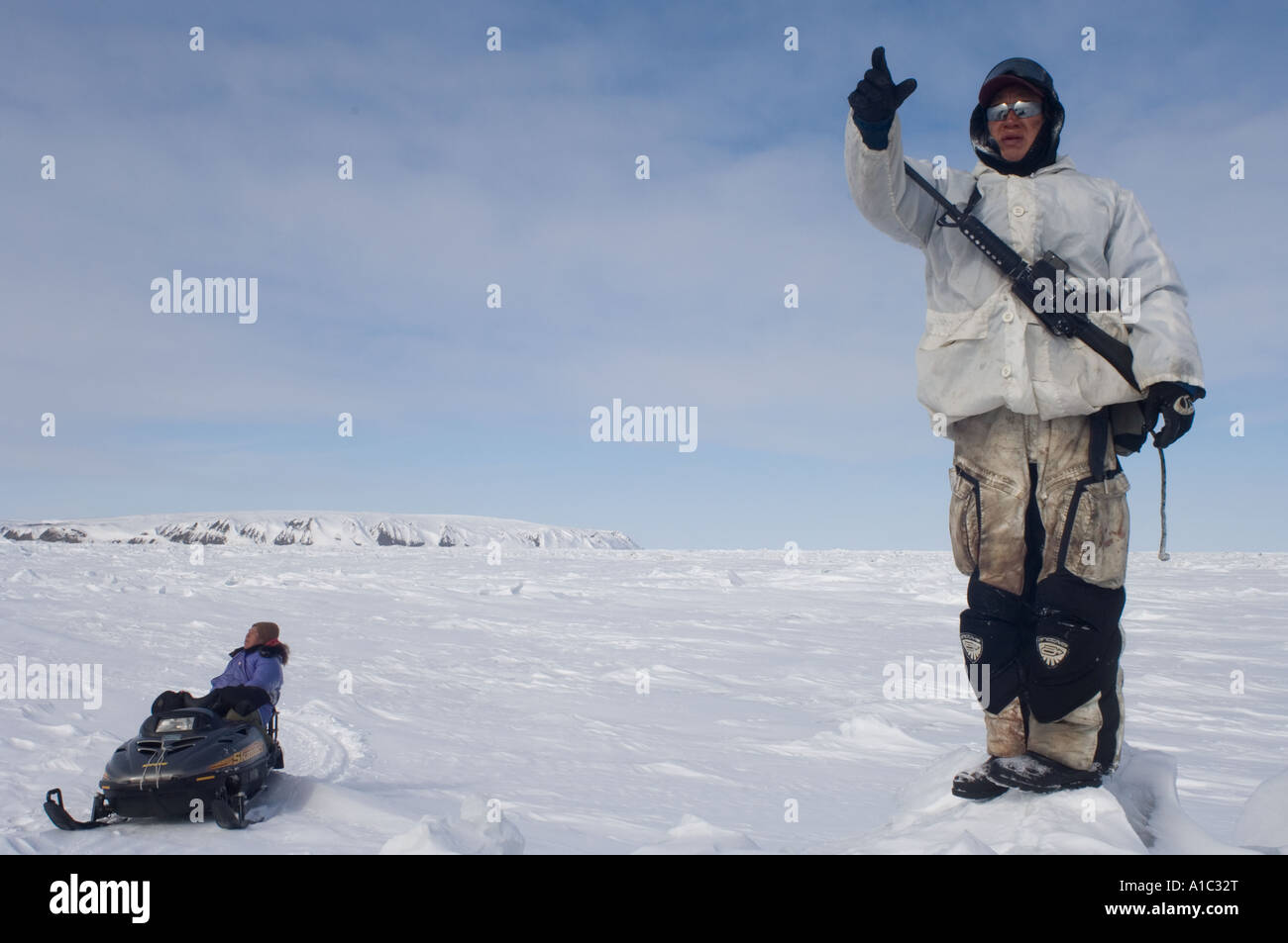 Jack Kayotuk and Alice Faith on the frozen Arctic ocean leaving ...