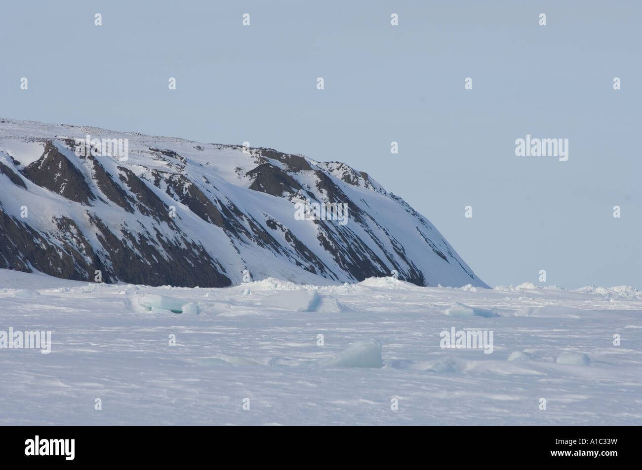 winter landscape on Herschel island on the frozen Arctic ocean off the ...