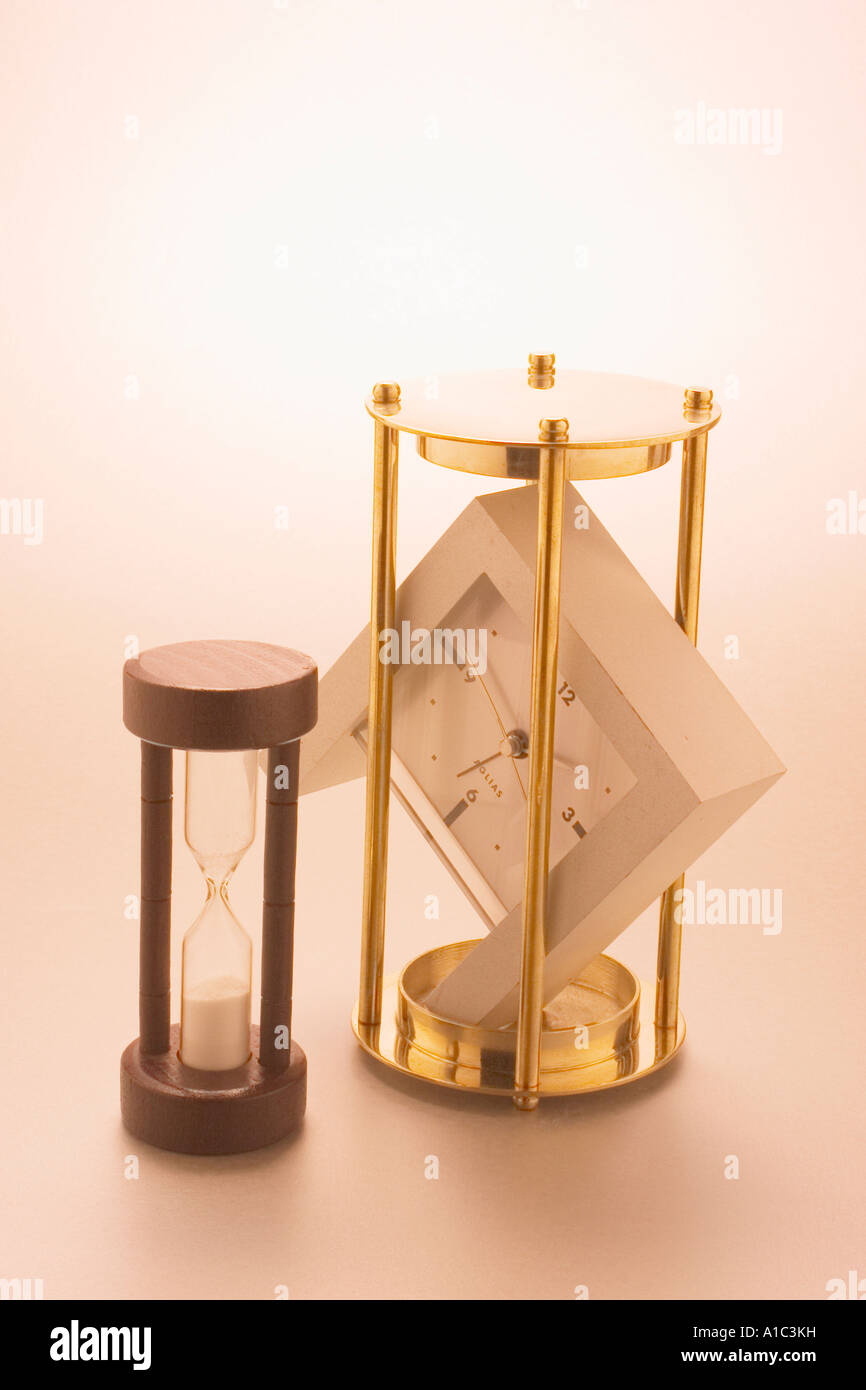 Sand Timers with Clock Stock Photo - Alamy