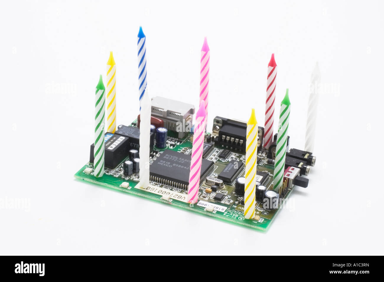 Birthday Candles on Circuit Board Stock Photo - Alamy