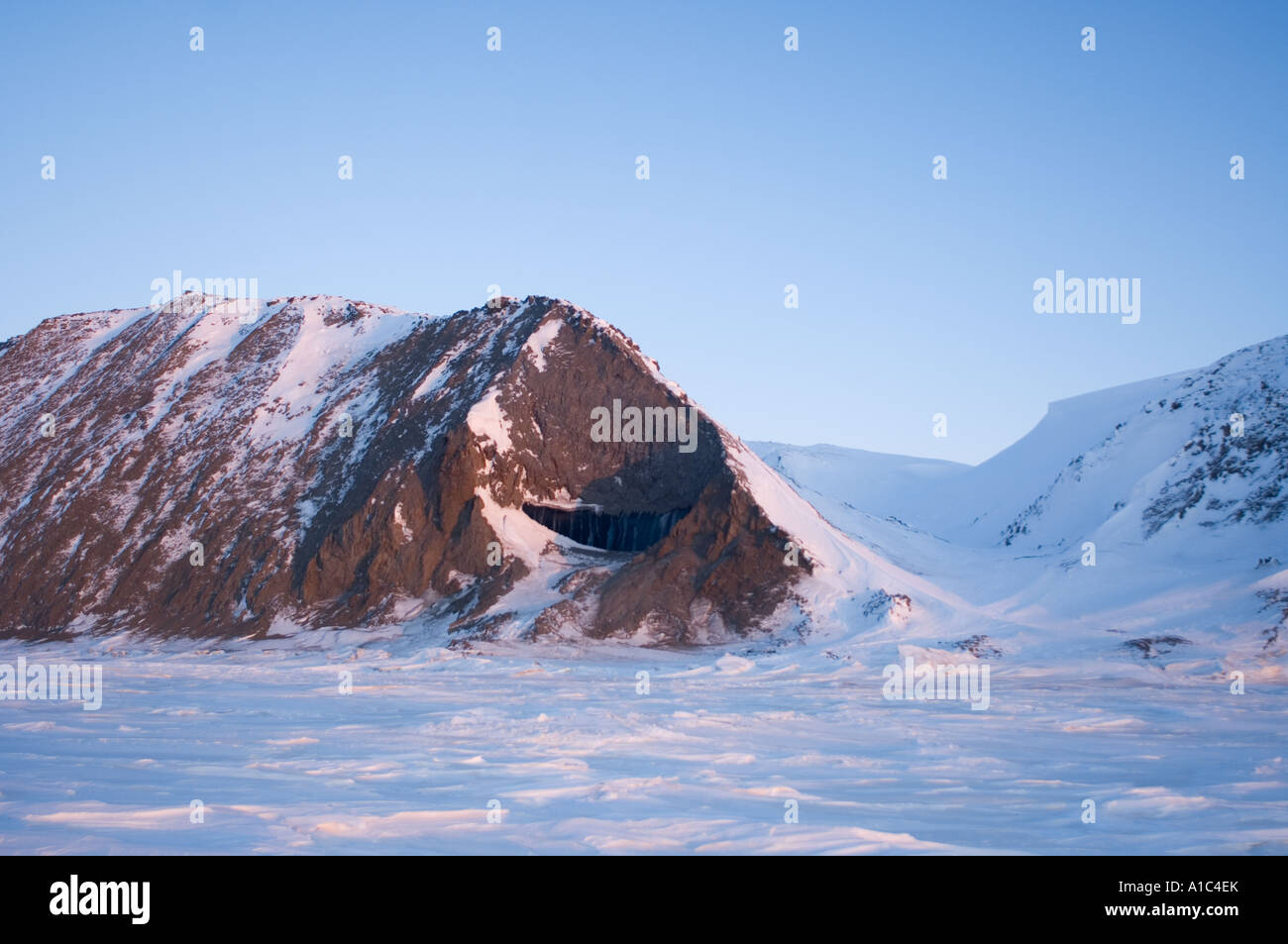 thousand year old ice in a side cliff on Herschel Island off the ...