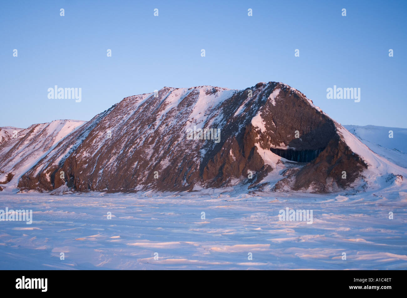 thousand year old ice in a side cliff on Herschel Island off the ...
