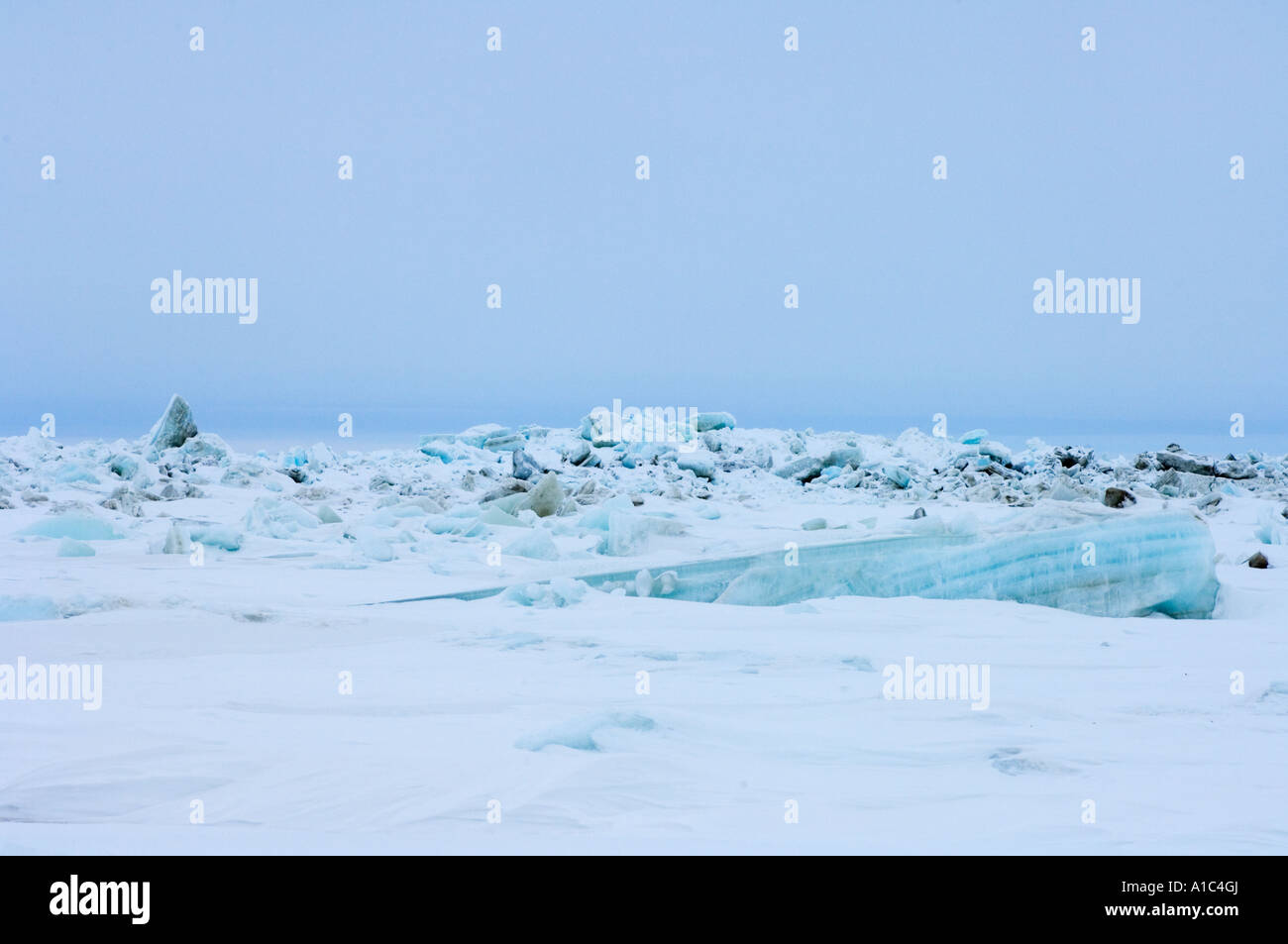 landscape of jumbled ice on the frozen Arctic ocean off Herschel island ...