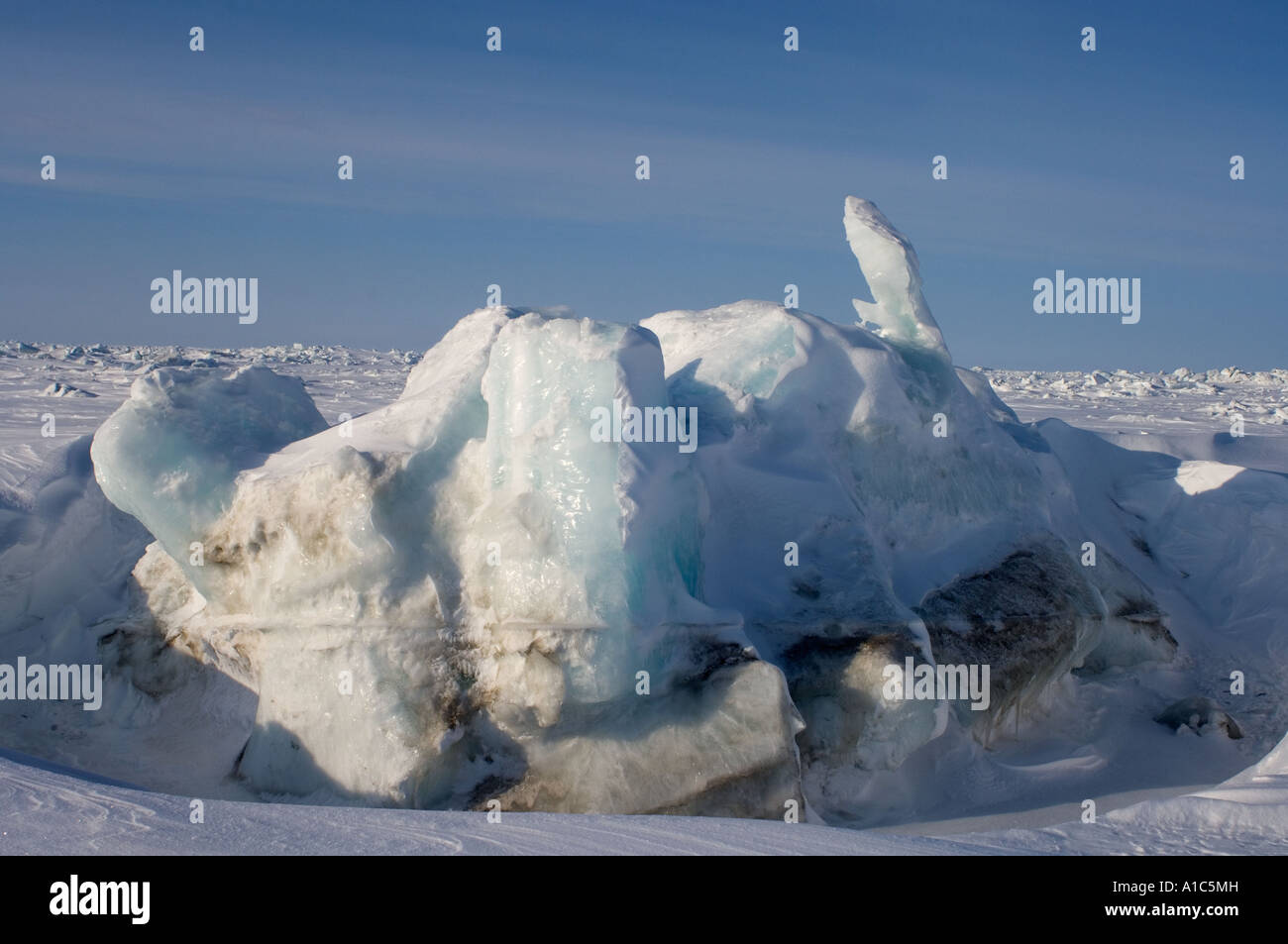landscape of jumbled ice on the frozen Arctic ocean off Herschel island ...