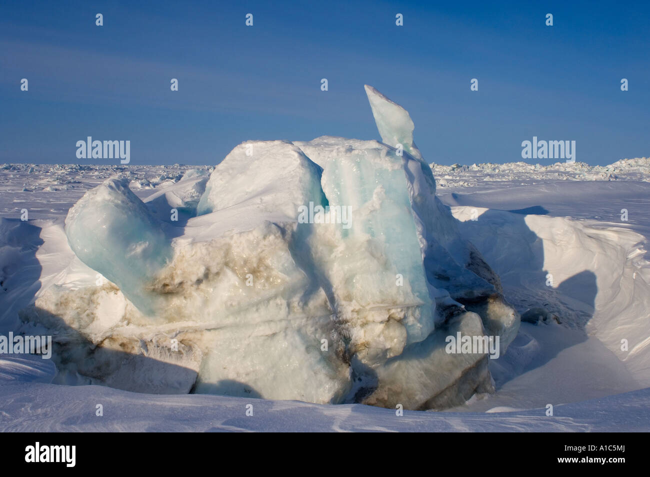 landscape of jumbled ice on the frozen Arctic ocean off Herschel island ...